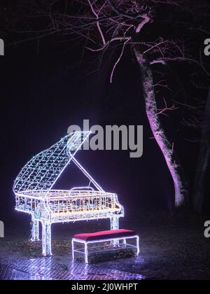Piano keyboard with Christmas decoration, closeup Stock Photo - Alamy