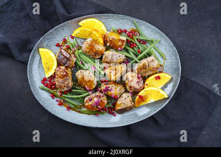 Modern style jusy seared pork pigllet tenderloin fillet meat medallions ...