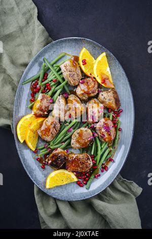 Jusy seared pork pigllet tenderloin fillet meat medallions with orange ...