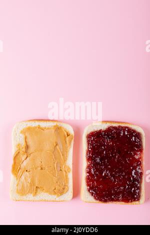 Directly above shot of open face peanut butter and jelly sandwich on ...