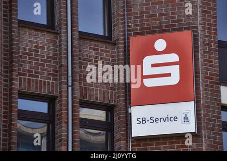 Logo of the Sparkasse bank on a brick wall in the city of Aachen ...