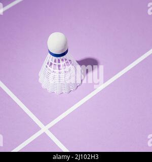 High angle shuttlecock purple background Stock Photo - Alamy
