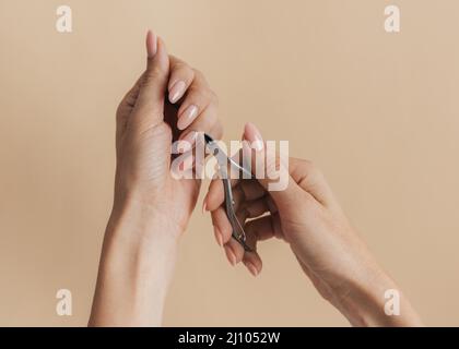 cutting cuticles healthy beautiful manicure Stock Photo - Alamy