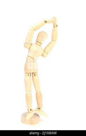 Wooden dummy stretching. Isolated on a white background Stock Photo - Alamy