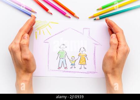 Childs drawing of happy family. Adoption concept Stock Photo - Alamy