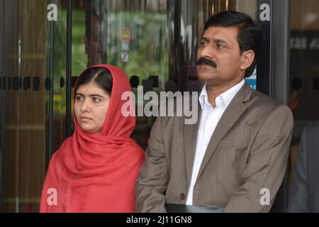 Malala Yousafzai, her father Ziauddin Yousafzai and brother Atal Khan ...