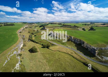 Limestone cliffs and farmland, Island Cliff, North Otago, South Island ...