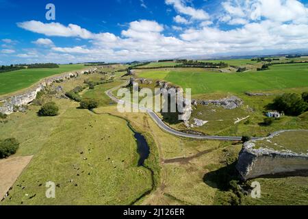 Limestone cliffs and farmland, Island Cliff, North Otago, South Island ...