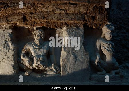 Stucco on the wall of the ancient Moghalmari monastery in Paschim ...