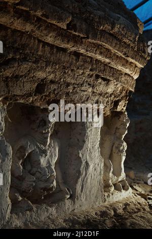 Stucco on the wall of the ancient Moghalmari monastery in Paschim ...