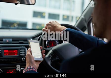 In contact on his commute. an unrecognizable businessman using his ...
