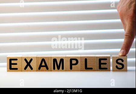EXAMPLE word made with building blocks isolated on white Stock Photo ...