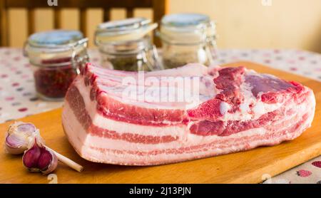 fresh piece of lard ready for salting Stock Photo - Alamy