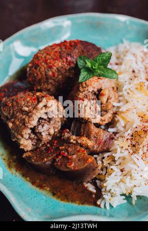 A plate with an Aleppo Arabic Syrian cuisine of machine grilled ...