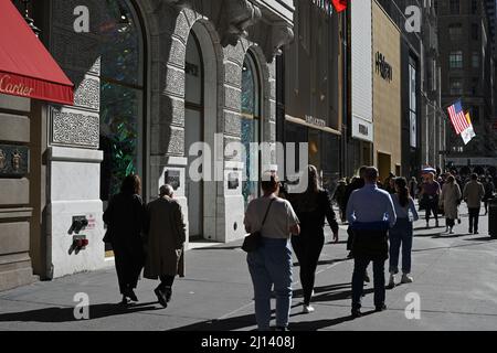 People walk on Fifth Avenue in Manhattan, New York City. (Photo by ...