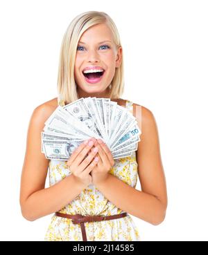 Money can buy happiness. a young businessman using his laptop to make ...