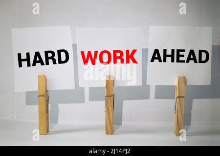 Hard Work Ahead sign, bisiness and job concept Stock Photo - Alamy
