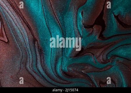 Abstract background from shimmer nail lacquer,chocolate and turquoise ...