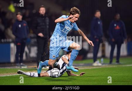 Notts County's Dion Kelly-Evans (right) makes a challenge on Stockport ...