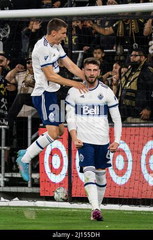 Vancouver Whitecaps defender Tristan Blackmon, left, heads the ball ...