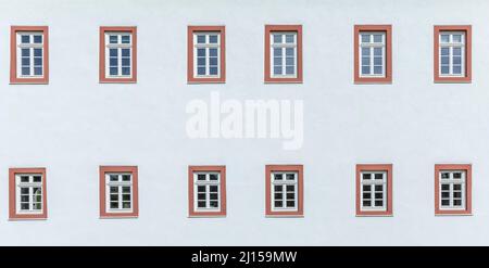 historic windows with red sandstone as harmonic background Stock Photo ...