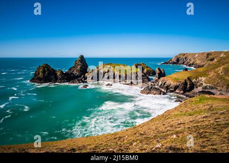 Long exposure from the cliffs of breaking waves on a sunny, spring day ...