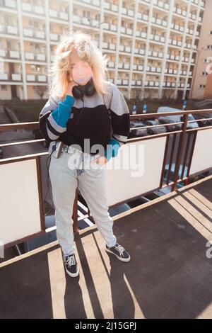 Photo of funky young blond lady yell wear sweater jeans isolated on ...