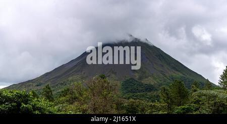 Beautiful cinematic aerial view of the Arenal Volcano in Costa Rica ...