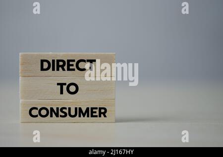 wooden cube block icon Direct to Consumer D2C on table.Business ...