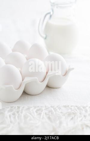 glass of whole cream milk and bread on table Stock Photo - Alamy