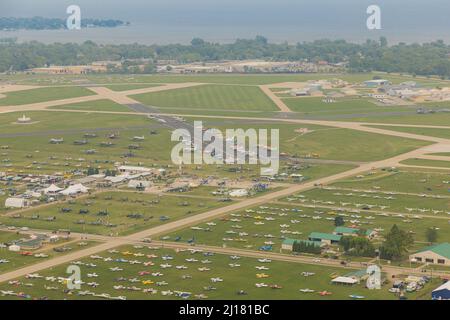 An aerial view of EAA Airventure grounds with planes and tents Stock ...