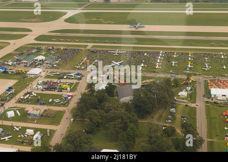 An aerial view of EAA Airventure grounds with planes and tents Stock ...