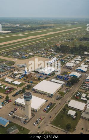 An aerial view of EAA Airventure grounds with planes and tents Stock ...
