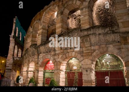 A closeup of Tourists around the Verona Roman arena at night, Italy ...