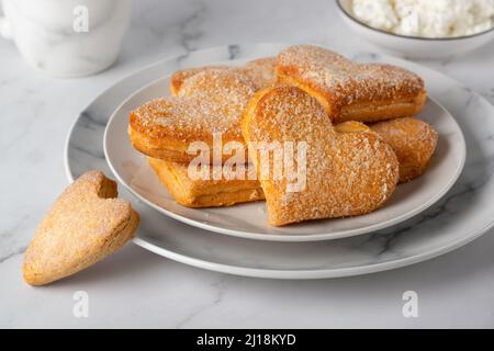 Heart-shaped cottage cheese biscuits for breakfast Stock Photo - Alamy