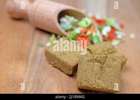 Vegetable bouillon, bouillon cubes in a closeup Stock Photo - Alamy
