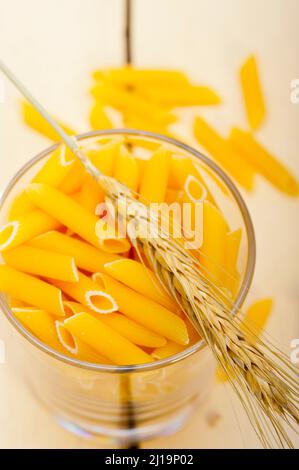 short Italian pasta penne with durum wheat grains Stock Photo - Alamy