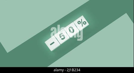 Minus 50% phrase on wooden blocks on black background. Sale business ...
