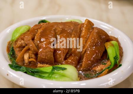 A delicious and mellow Chinese dish, steamed pork with taro Stock Photo ...