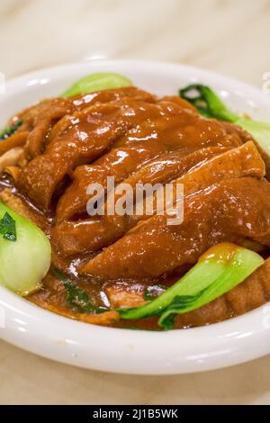 A delicious and mellow Chinese dish, steamed pork with taro Stock Photo ...