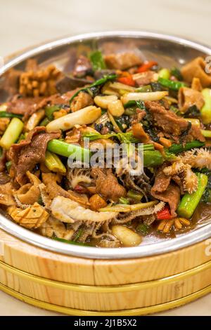 A delicious Guangxi dish, stir-fried beef offal Stock Photo - Alamy