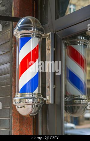 Barber Pole Retro Swirl Sign at Hairdresser Shop Stock Photo - Alamy