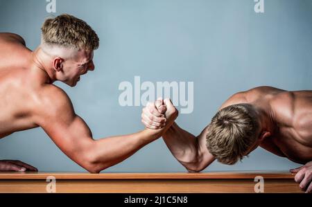 Hand wrestling, compete. Hands or arms of man. Muscular hand. Clasped ...