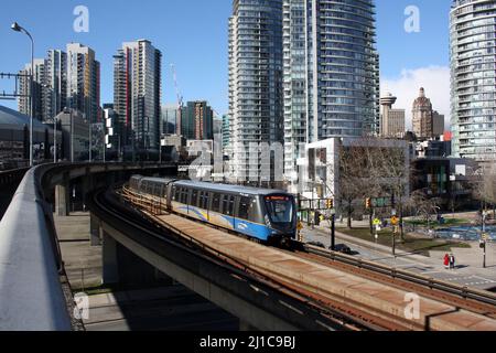 The SkyTrain riding in downtown Vancouver, British Columbia, Canada ...