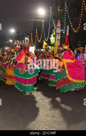 Group of men dressed as horse mounted soldiers, in colourful attire ...