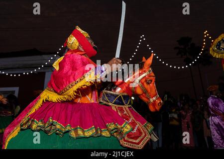 Group of men dressed as horse mounted soldiers, in colourful attire ...