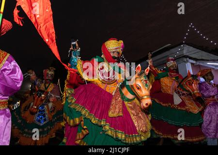 Group of men dressed as horse mounted soldiers, in colourful attire ...