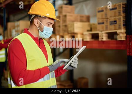 A TV camera man wearing a mask covers a UFC 249 mixed martial art bout ...