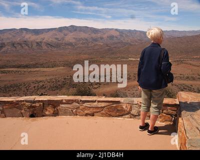 People contemplating the spectacular Arizona from a highway overlook on ...