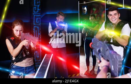 Young people playing laser tag in bright beams Stock Photo - Alamy